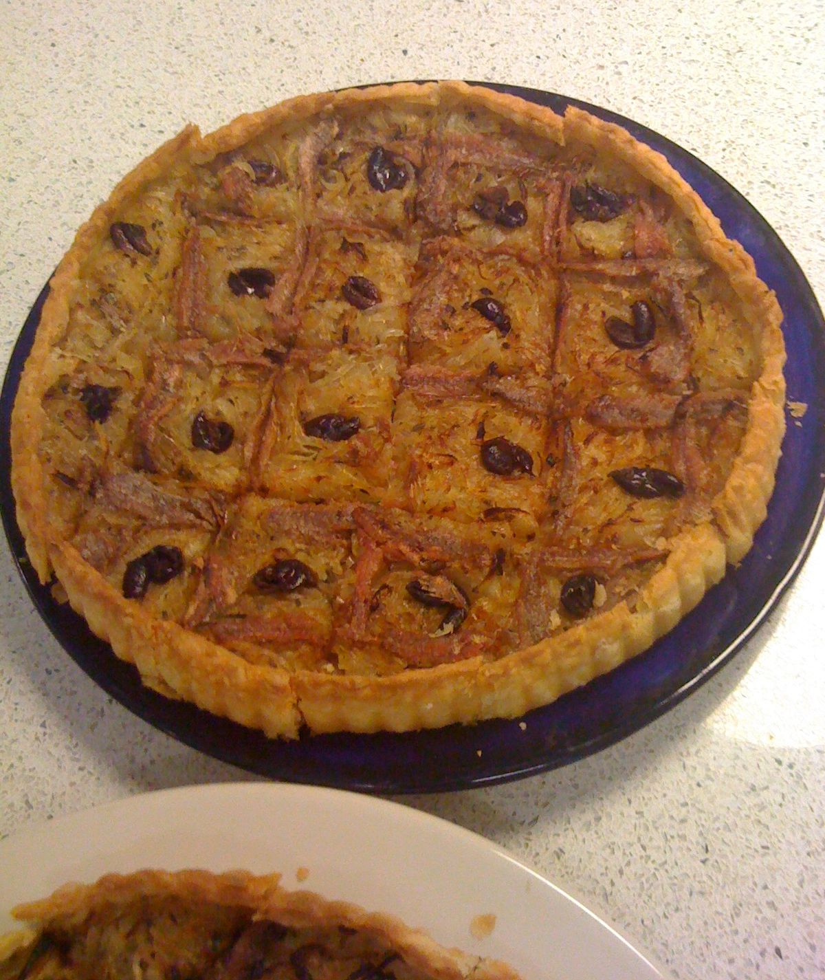 Pissaladière, a French onion tart - Adán Medrano
