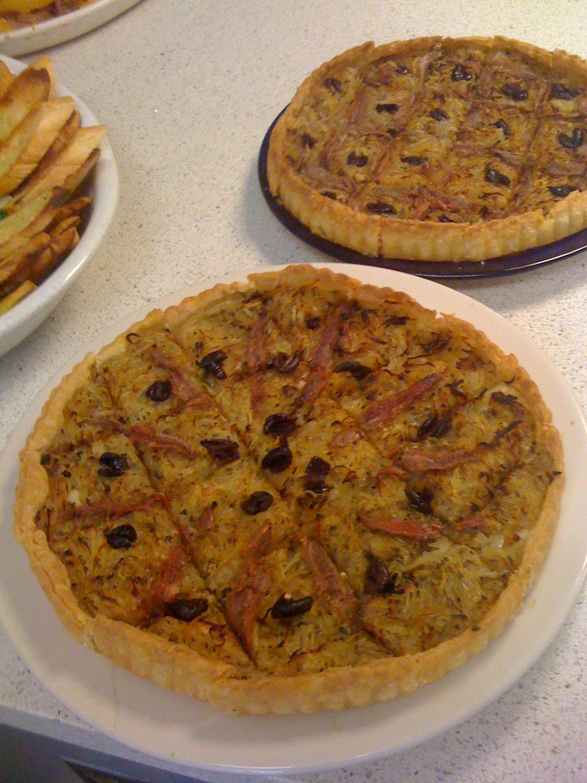 Pissaladière, a French onion tart - Adán Medrano